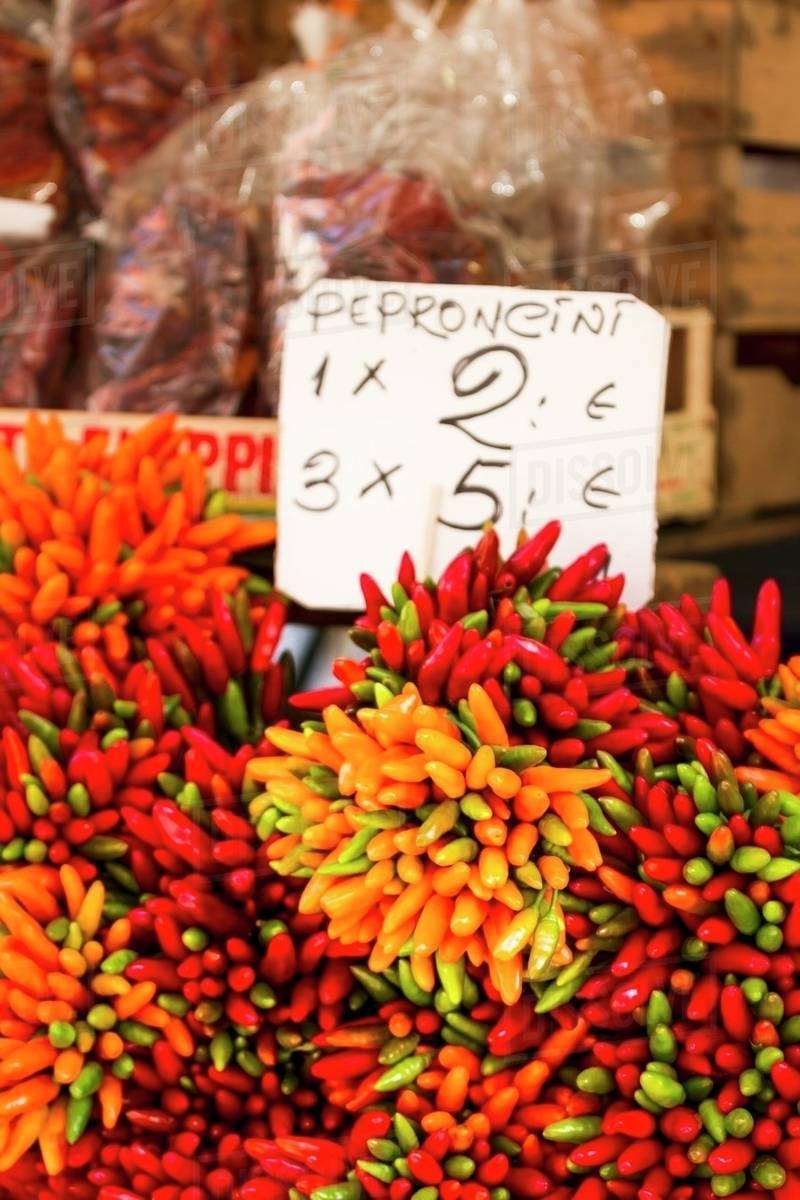 Bunches of fresh chilli peppers at a market - Royalty-free Stock Photo ...