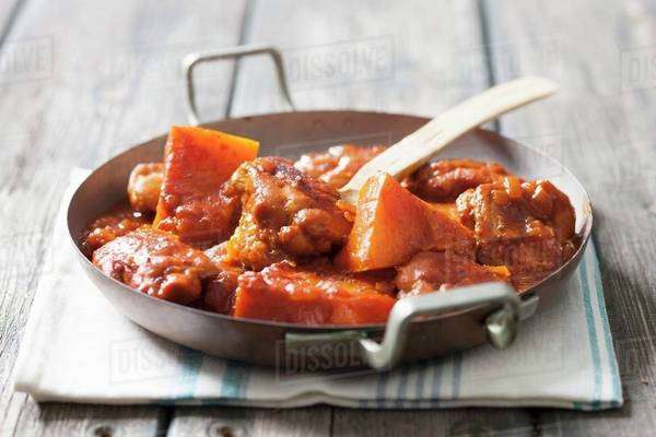 Chicken ragout with pumpkin - Royalty-free Stock Photo | Dissolve
