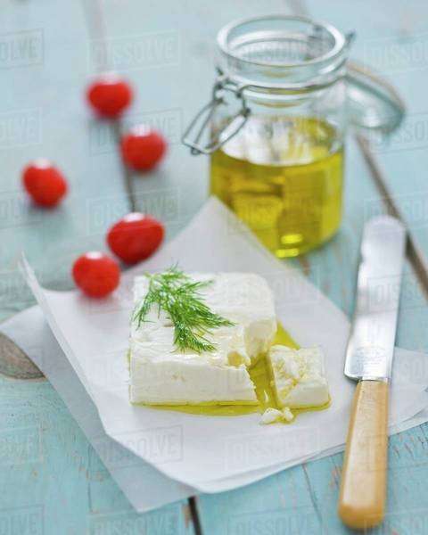 Feta cheese in olive oil - Royalty-free Stock Photo | Dissolve