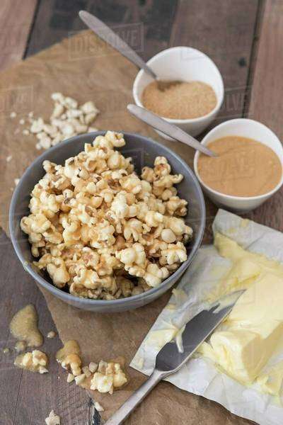 Popcorn flavoured with sugar, peanut mousse and butter - Royalty-free ...