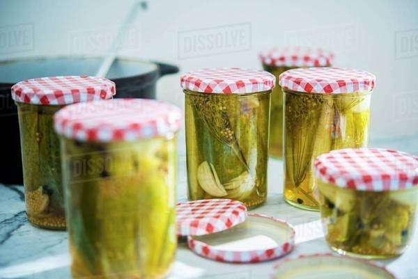 Jars of gherkins - Royalty-free Stock Photo | Dissolve