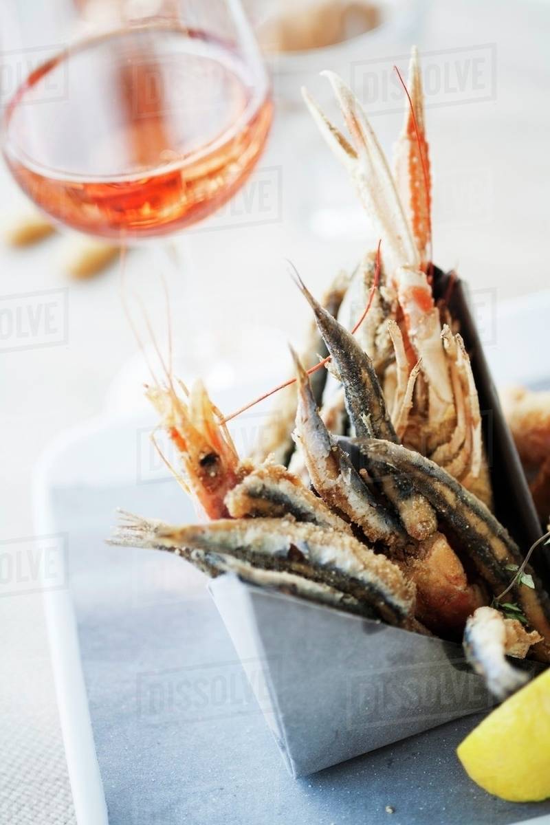 Fritto misto (deep-fried fish and langoustine, Italy) - Stock Photo ...