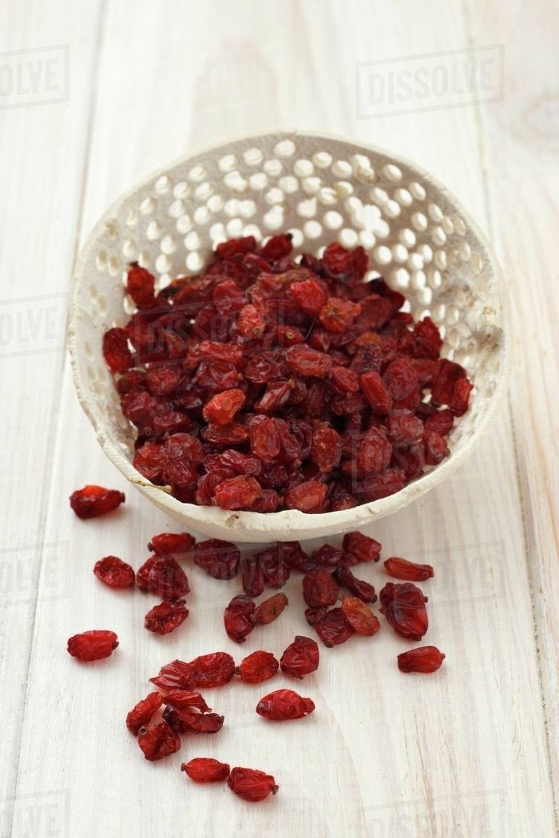 Dried barberries in a dish - Royalty-free Stock Photo | Dissolve
