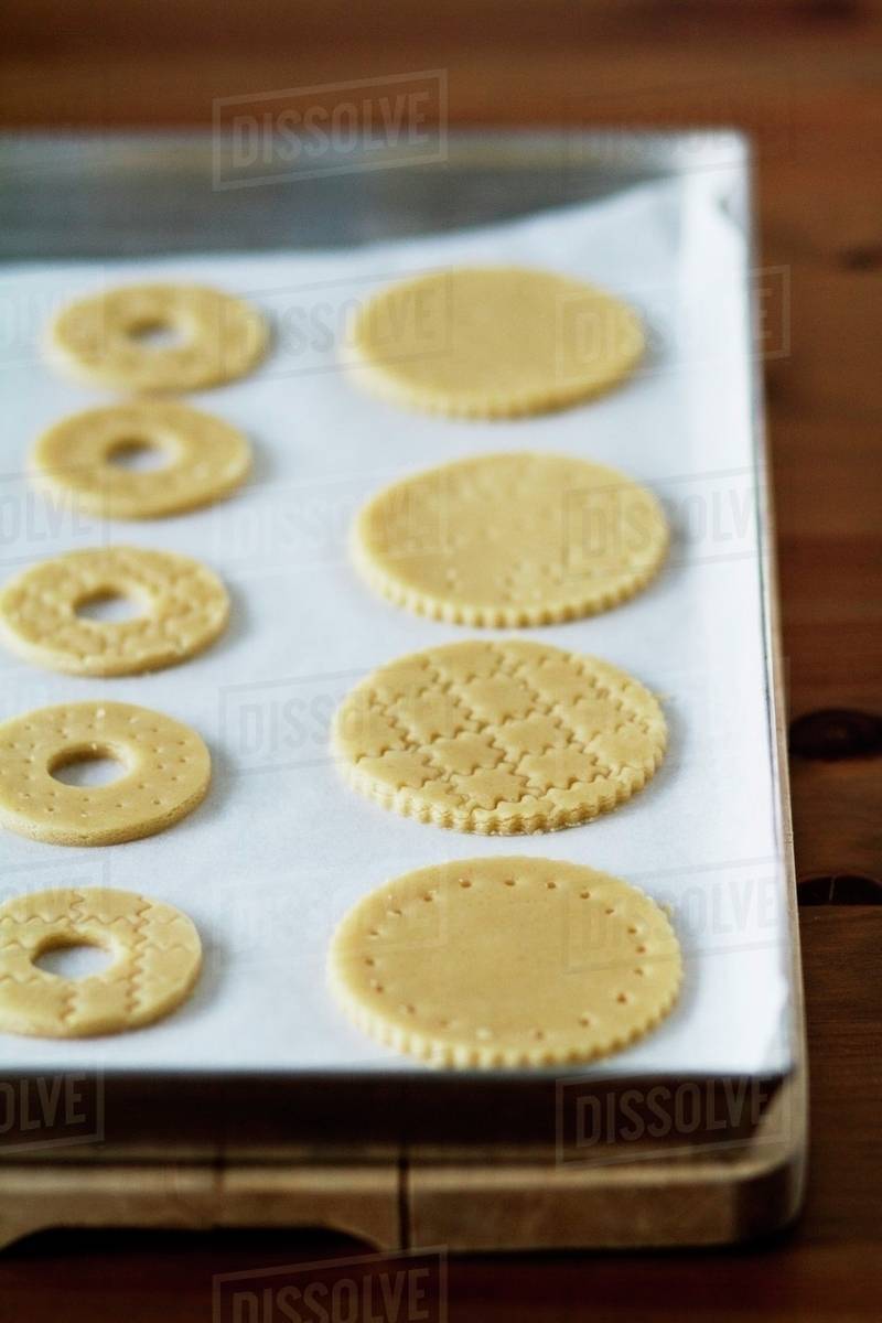 Unbaked shortcrust pastry biscuits - Royalty-free Stock Photo | Dissolve
