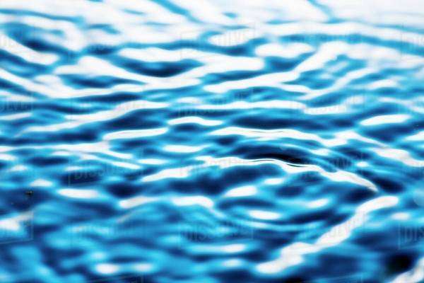 Agitated surface of water - Stock Photo - Dissolve