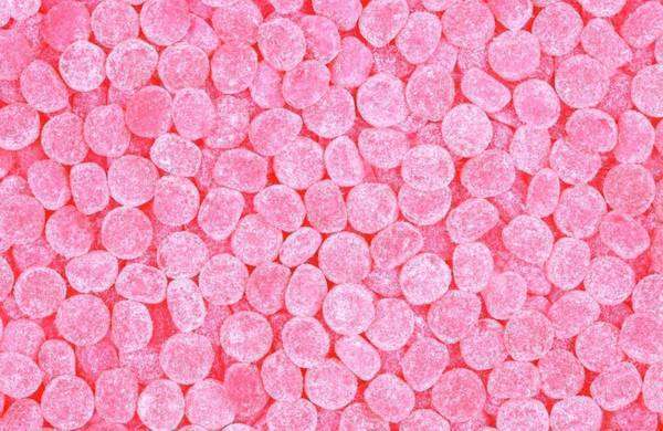 Rose colored chewy candies - Royalty-free Stock Photo | Dissolve