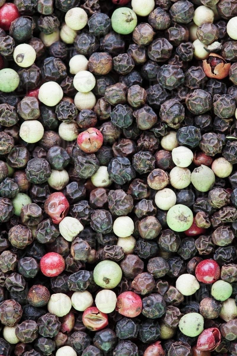 Many varieties of pepper corns - Stock Photo - Dissolve