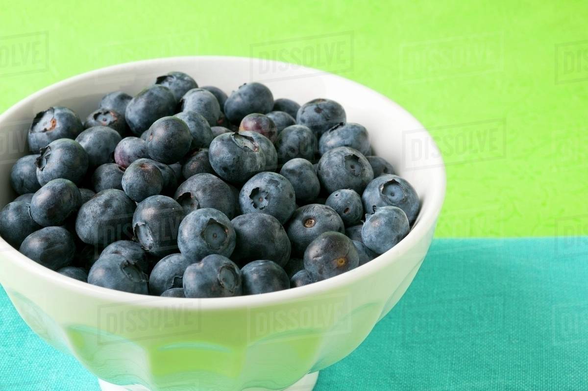 Fresh blueberries in a bowl - Royalty-free Stock Photo | Dissolve