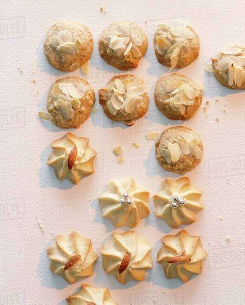 Almond biscuits and piped biscuits - Royalty-free Stock Photo | Dissolve