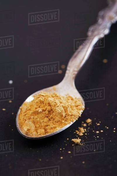 Gold Dust on a Silver Spoon - Royalty-free Stock Photo | Dissolve