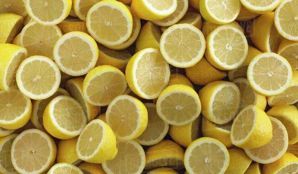 Lots of lemons cut in half (filling the image) - Royalty-free Stock ...