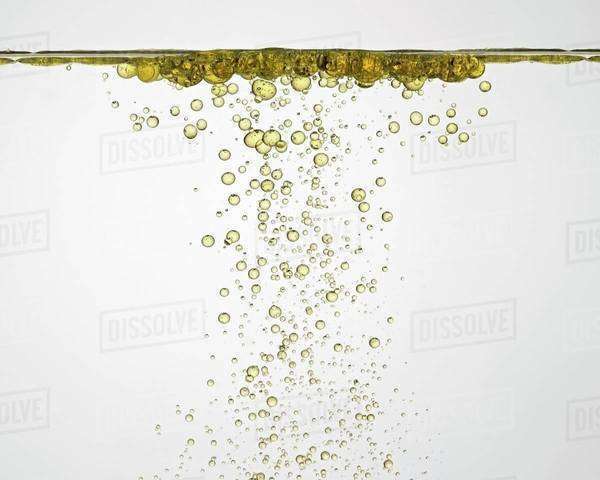 Oil drops in water, close-up - Royalty-free Stock Photo | Dissolve