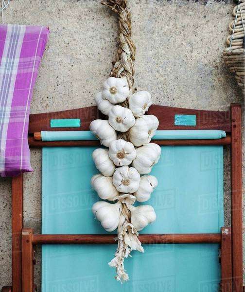 A rope of garlic - Royalty-free Stock Photo | Dissolve