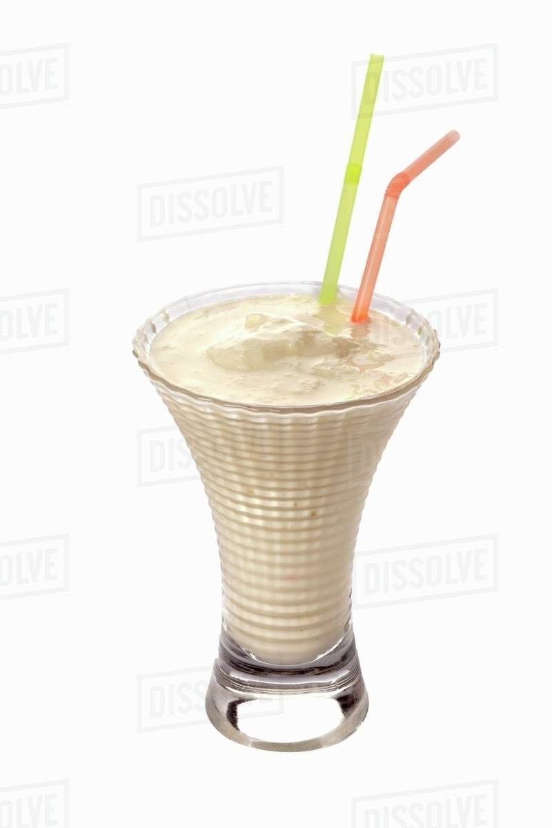 An ice cream shake with two straws - Royalty-free Stock Photo | Dissolve