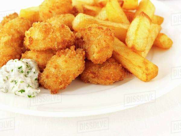 Breaded scampi with chips - Royalty-free Stock Photo | Dissolve