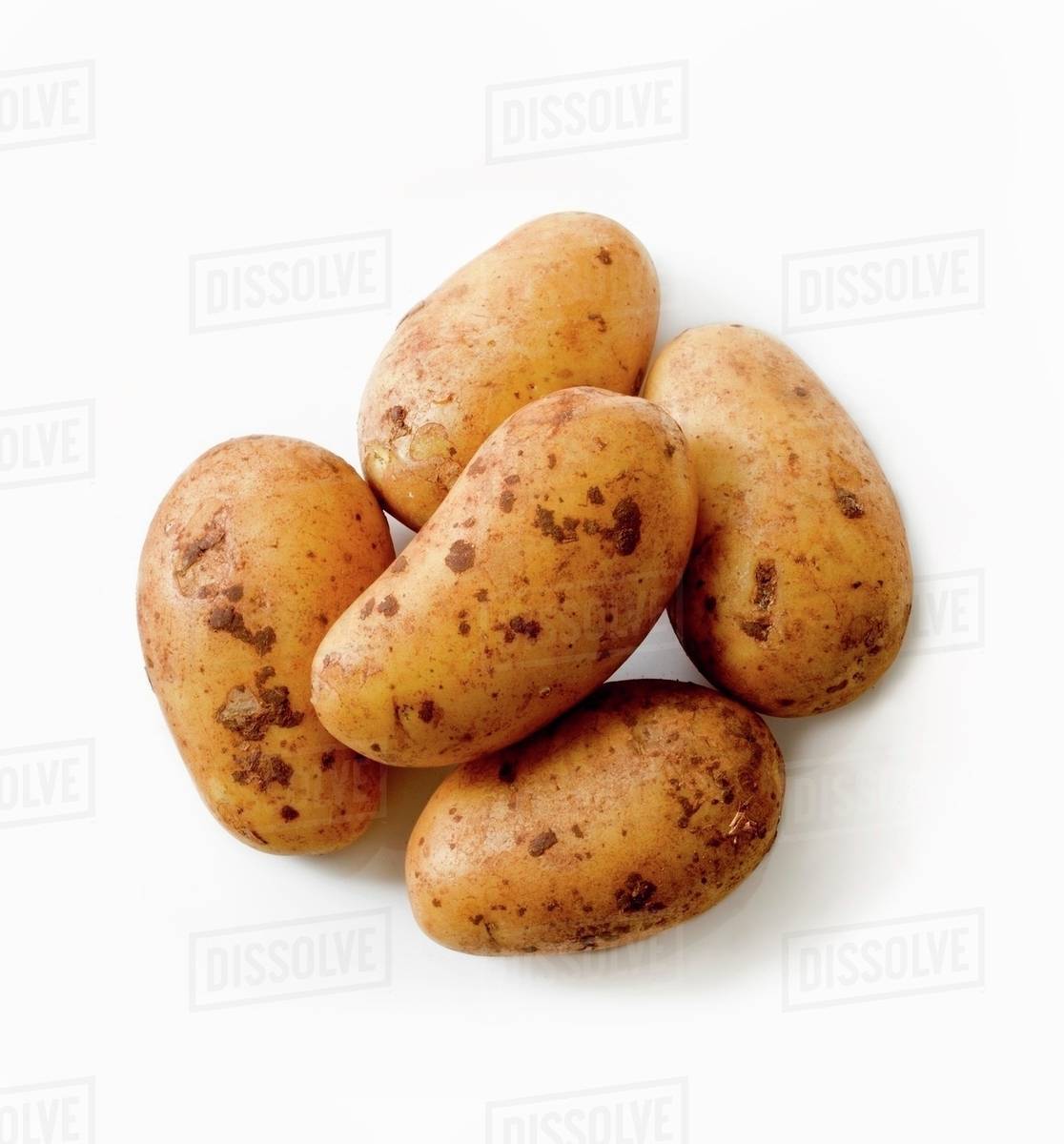 Five potatoes - Royalty-free Stock Photo | Dissolve