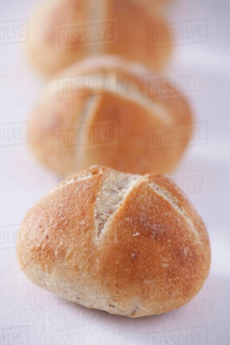 Three bread rolls - Stock Photo - Dissolve