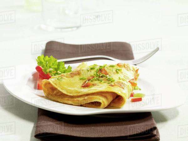 A country omelette on a plate - Royalty-free Stock Photo | Dissolve