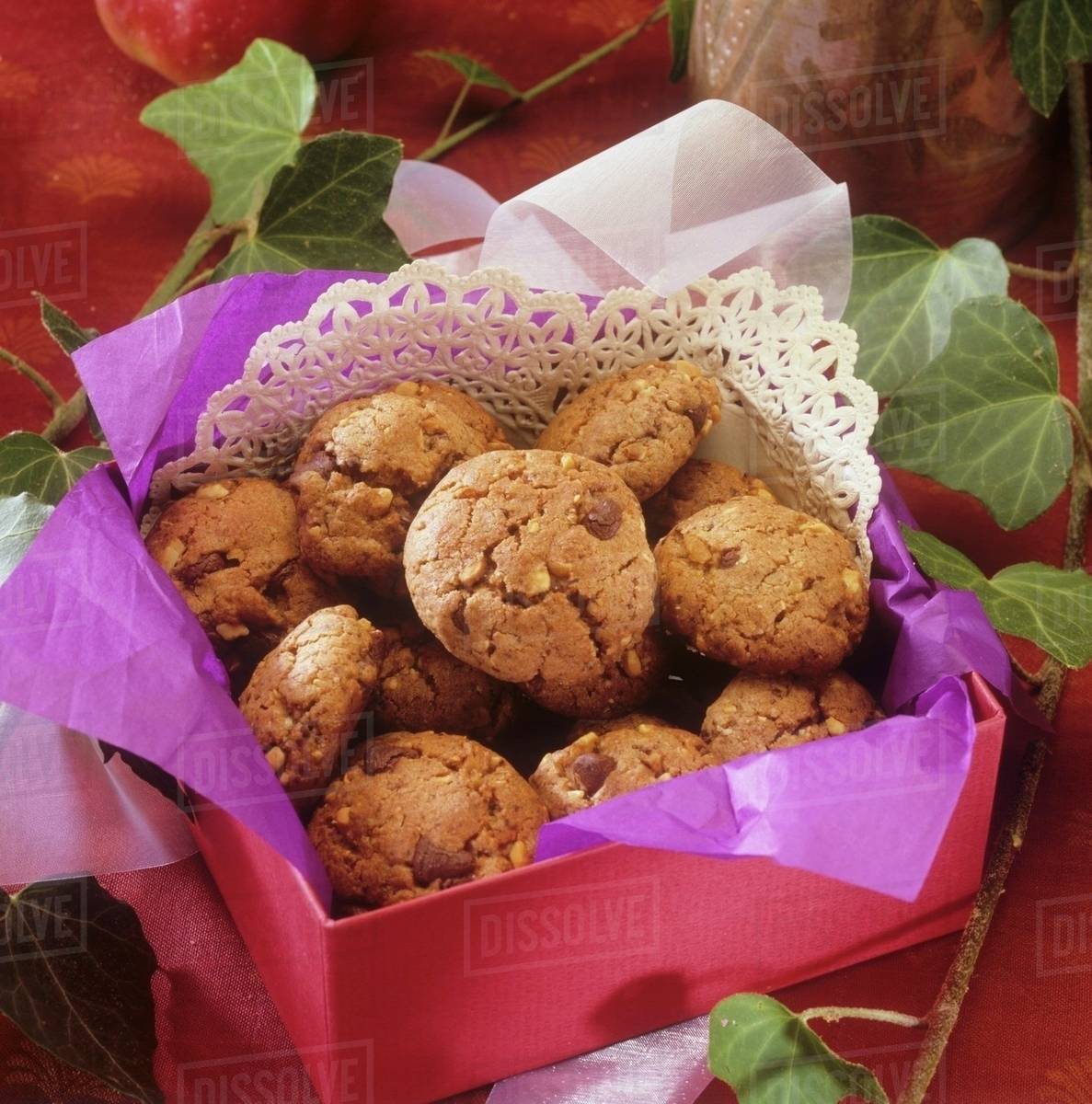 Chocolate nut biscuits in a red box - Royalty-free Stock Photo | Dissolve