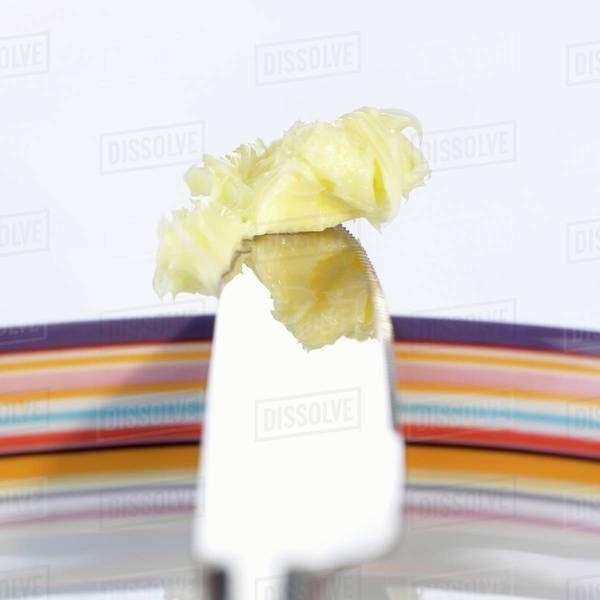 Soft butter on knife - Royalty-free Stock Photo | Dissolve