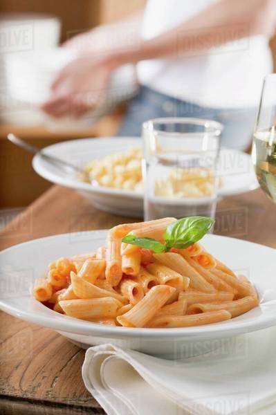 Two pasta dishes - Royalty-free Stock Photo | Dissolve