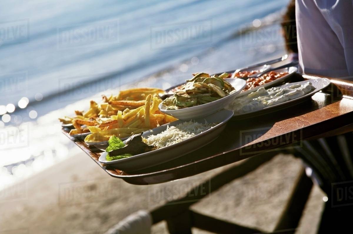 Assorted snacks served on a tray - Stock Photo - Dissolve