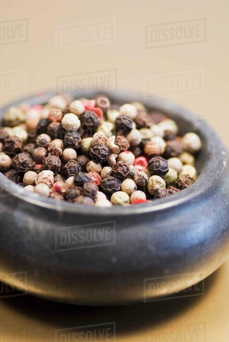 Coloured pepper in a small dish - Royalty-free Stock Photo | Dissolve