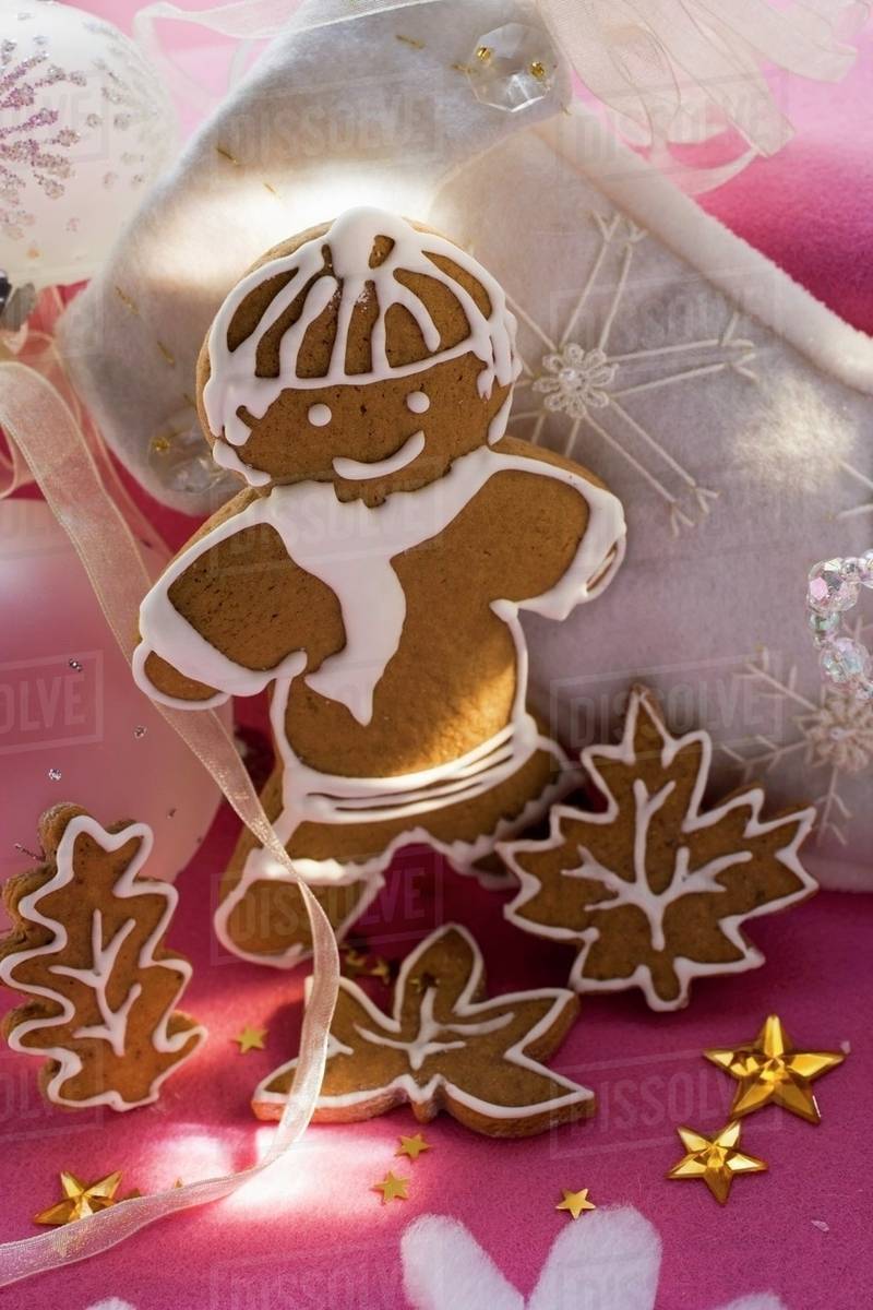 Gingerbread man and gingerbread leaves (for Christmas) - Stock Photo ...