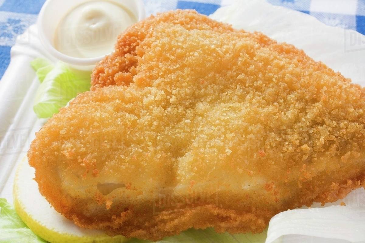Breaded fish fillet with mayonnaise (close-up) - Royalty-free Stock ...