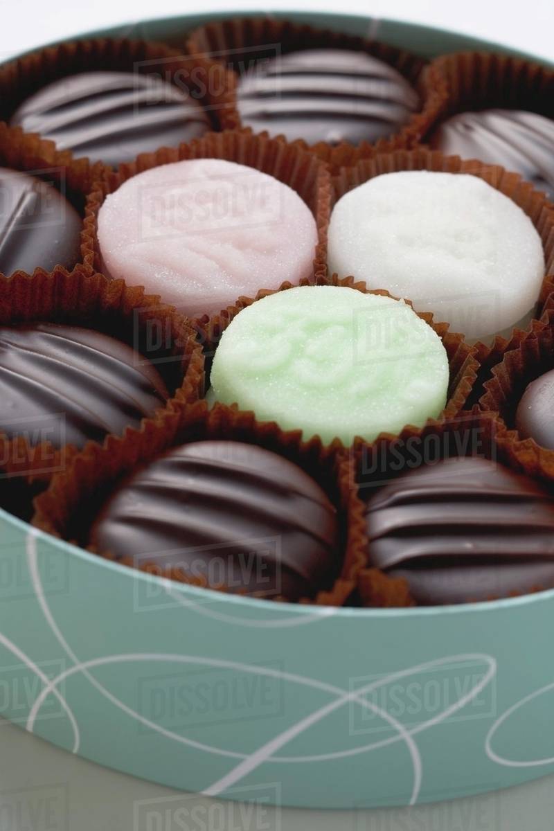 Assorted chocolates in round box (detail) - Royalty-free Stock Photo ...