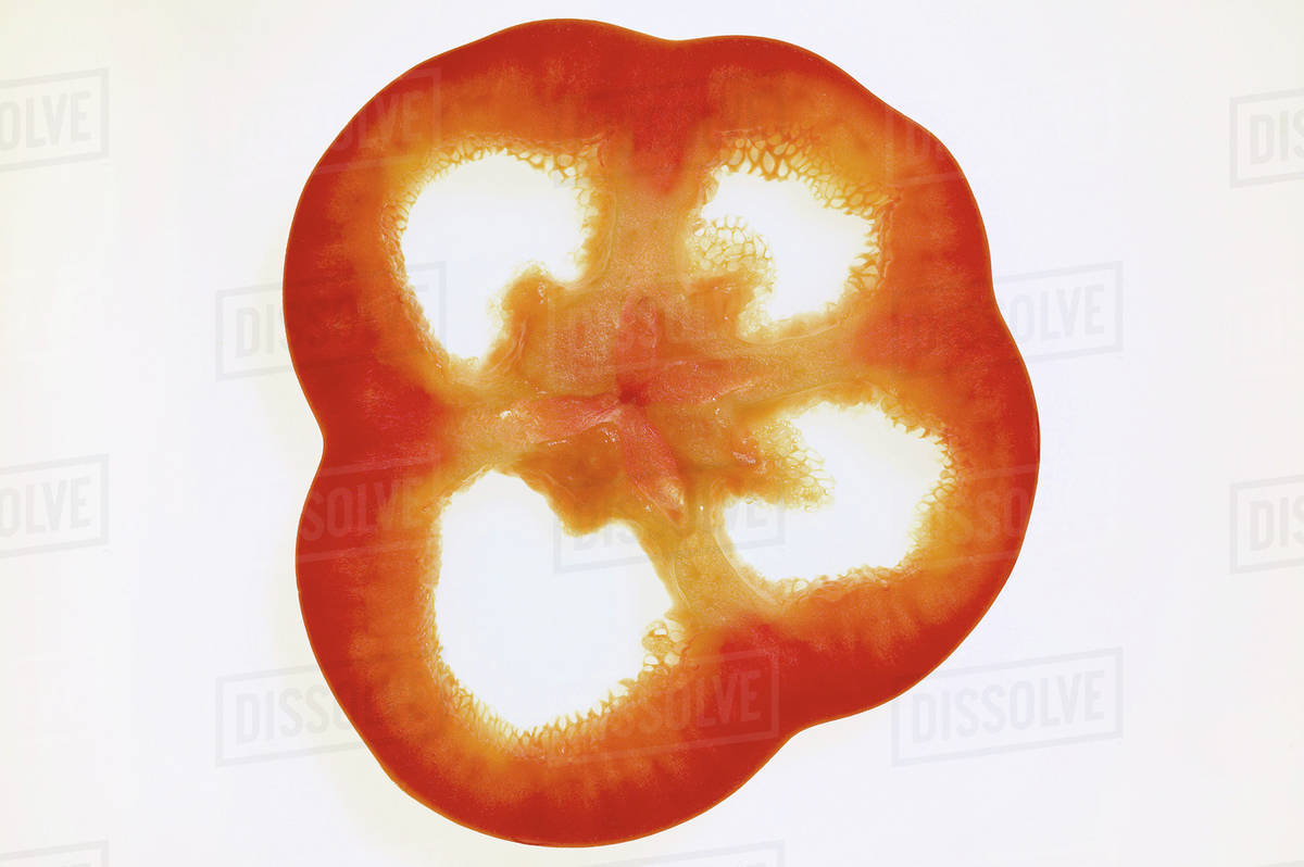 Slice of red pepper, backlit - Royalty-free Stock Photo | Dissolve