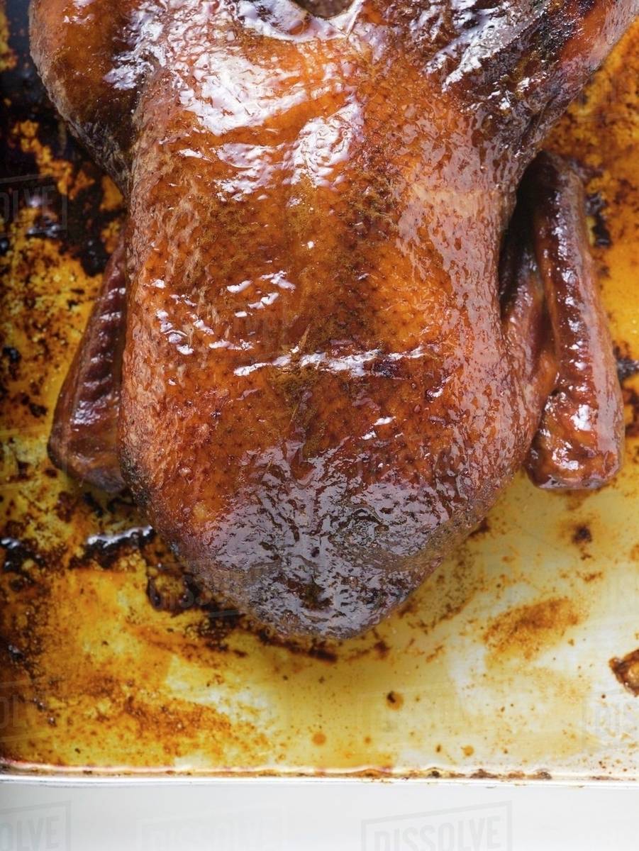 Crispy roast duck (overhead view) - Royalty-free Stock Photo | Dissolve