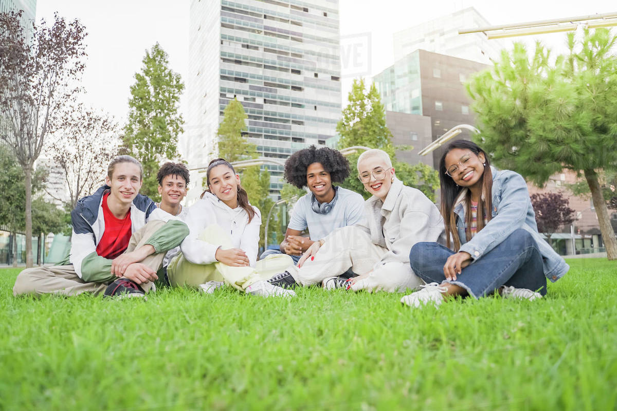 Group of multiethnic friends having fun together with self portrait on ...