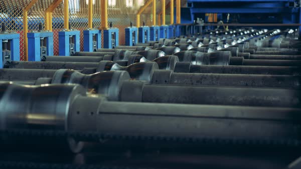 Rollers of a factory equipment are spinning at intervals - Stock Video ...