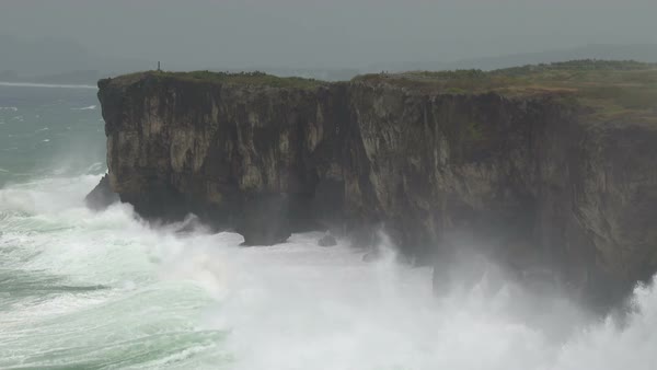 Huge hurricane waves crash against massive cliffs - Stock Video Footage ...