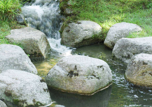 Stepping stones in stream - Royalty-free Stock Photo | Dissolve