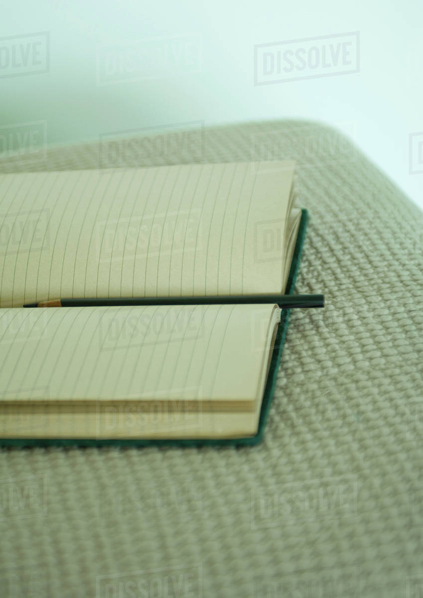 Open journal - Stock Photo - Dissolve