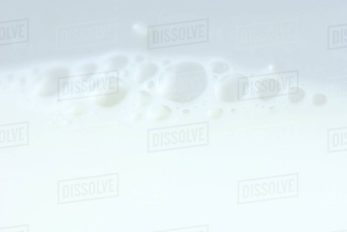 Milk bubbles, extreme close-up - Royalty-free Stock Photo | Dissolve