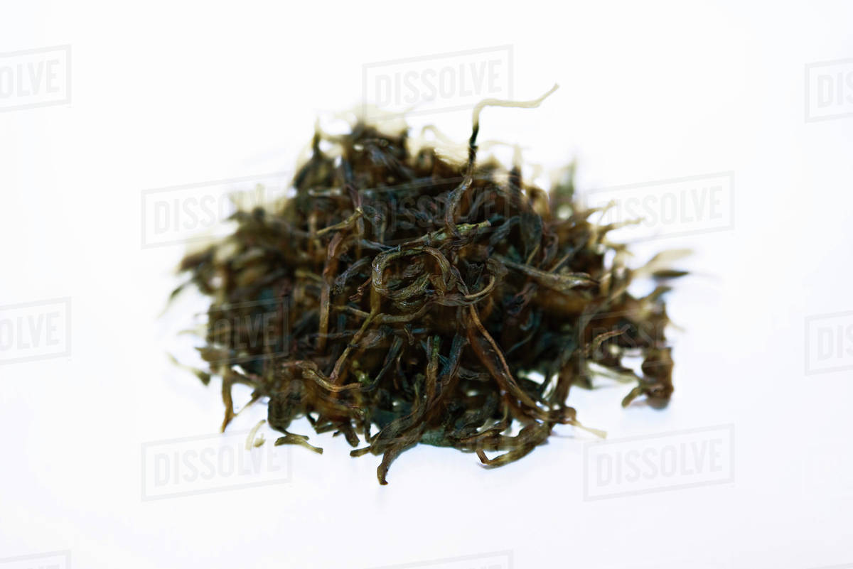 Loose tea leaves in pile - Royalty-free Stock Photo | Dissolve