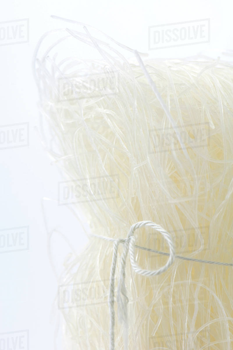 Cellophane noodles tied with string, close-up - Royalty-free Stock ...