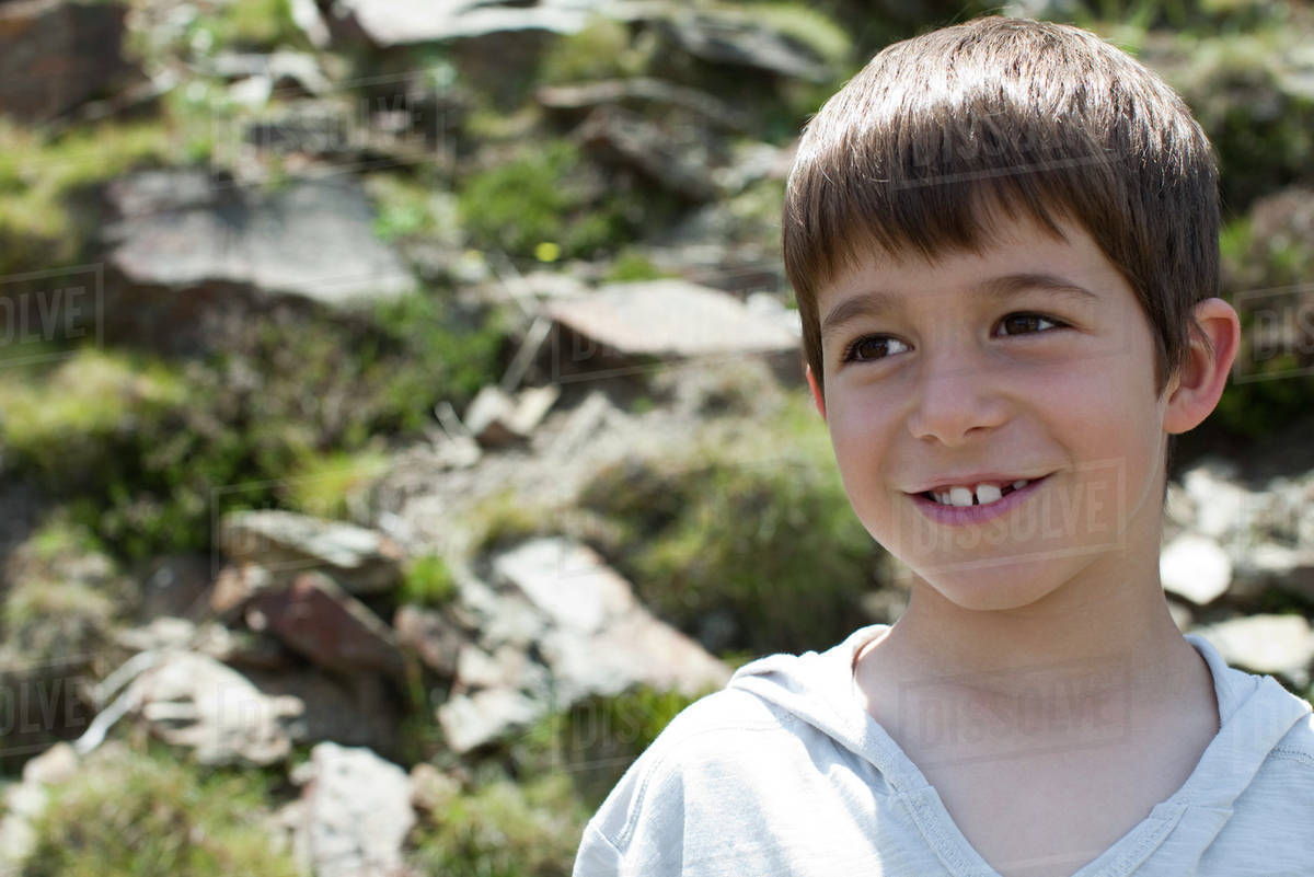Boy in nature, portrait - Stock Photo - Dissolve