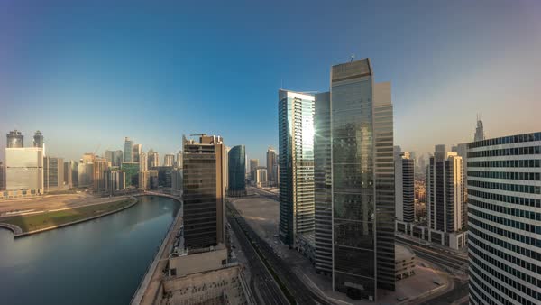 Cityscape with sun reflected from skyscrapers of Dubai Business Bay ...