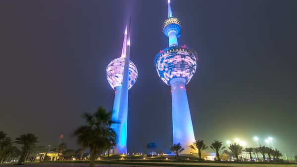 The Kuwait Towers day to night transition hyperlapse illuminated at ...