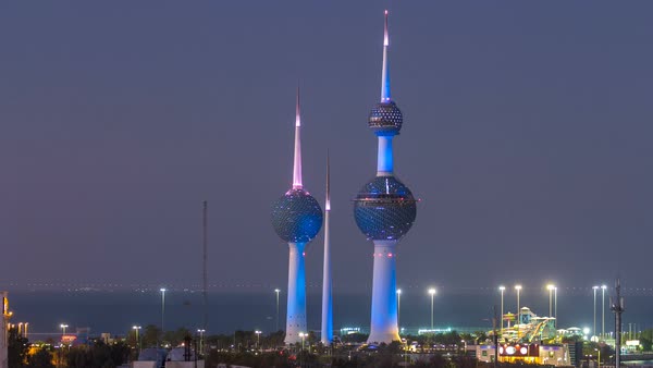 Top view of Kuwait Towers day to night transition timelapse illuminated ...