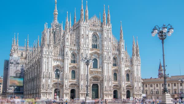The Duomo cathedral timelapse. Front view with people walking on square ...