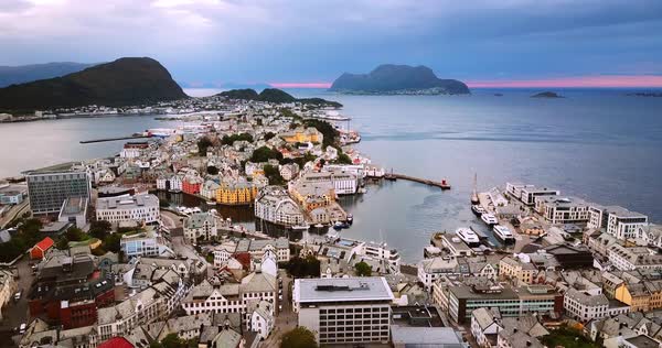 Alesund, Norway. Aerial view of Alesund, Norway at sunset. Colorful sky ...