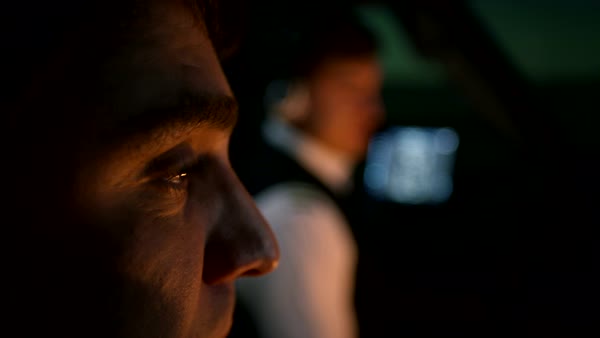 Pilot and co-pilot inside aircraft cockpit flying plane - Stock Video ...