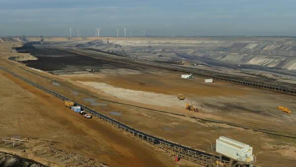 Open-pit mining site near wind turbines - 4K Rights-managed Stock Video ...