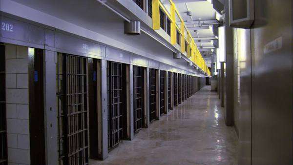 Zooming in of prison cells, prison interior in Chicago, Illinois ...