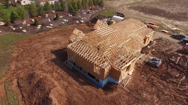 House being built, construction frame near completion, aerial view ...